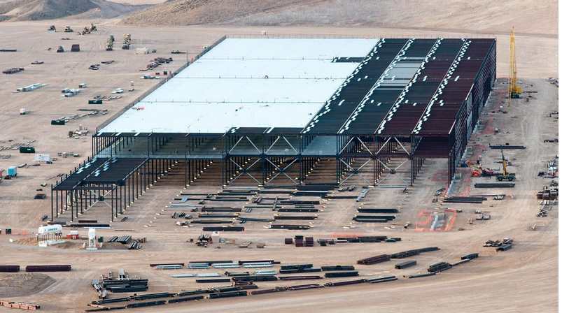 About 100 workers walk out at Tesla battery plant building site ...