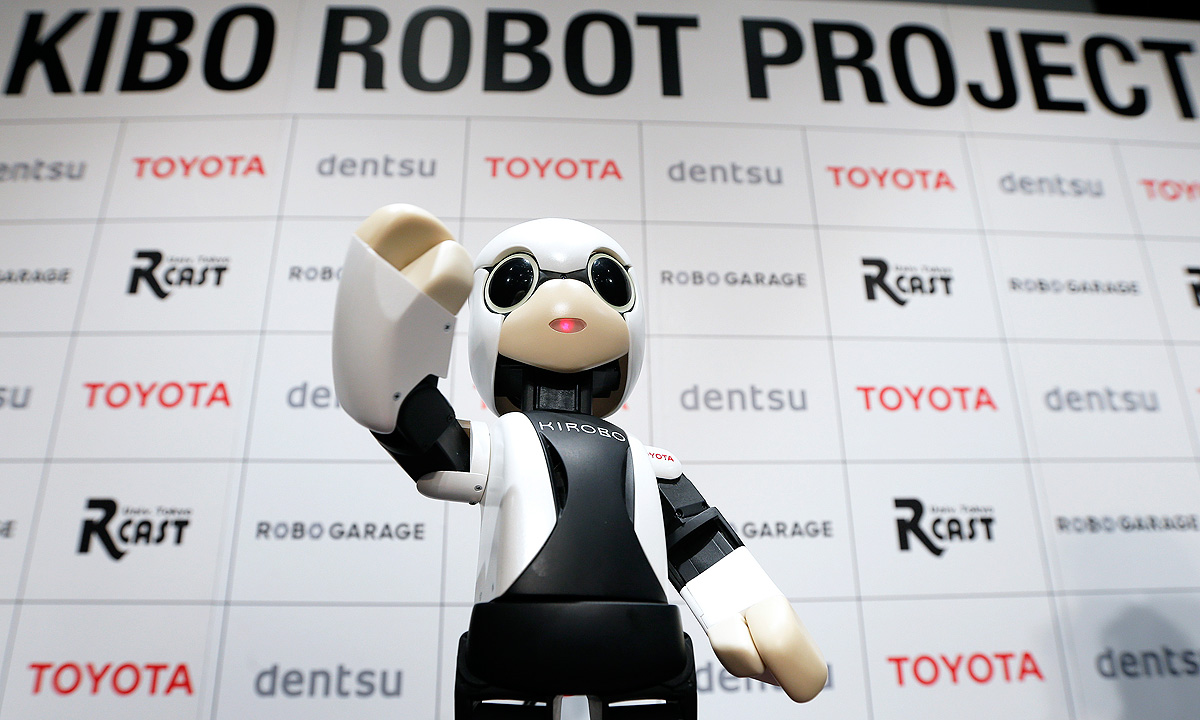 Toyota robot booked for first chat with human in space | Automotive News