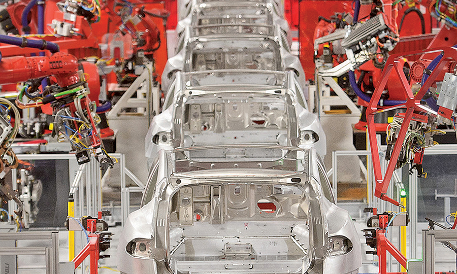 Tesla idles California plant to retool for electric SUVs | Automotive News