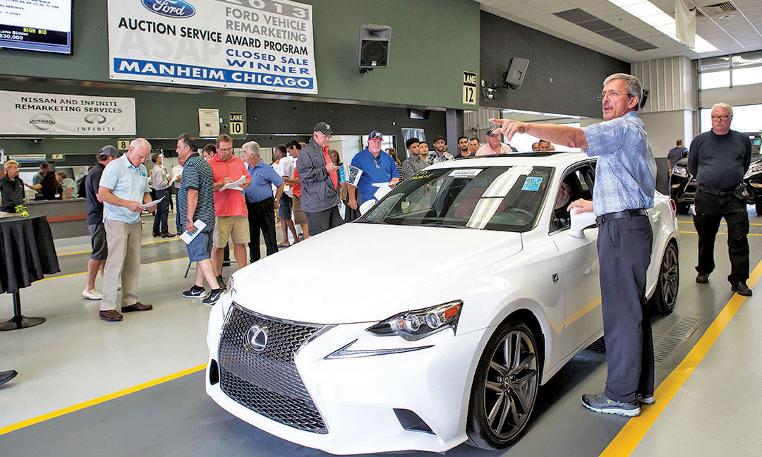 ADESA, Manheim refocus on physical auctions in Chicago | Automotive News