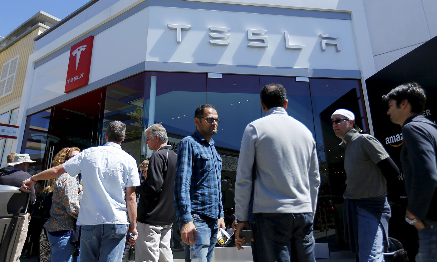 Tesla fans line up, camp out to sign up for Model 3 | Automotive News