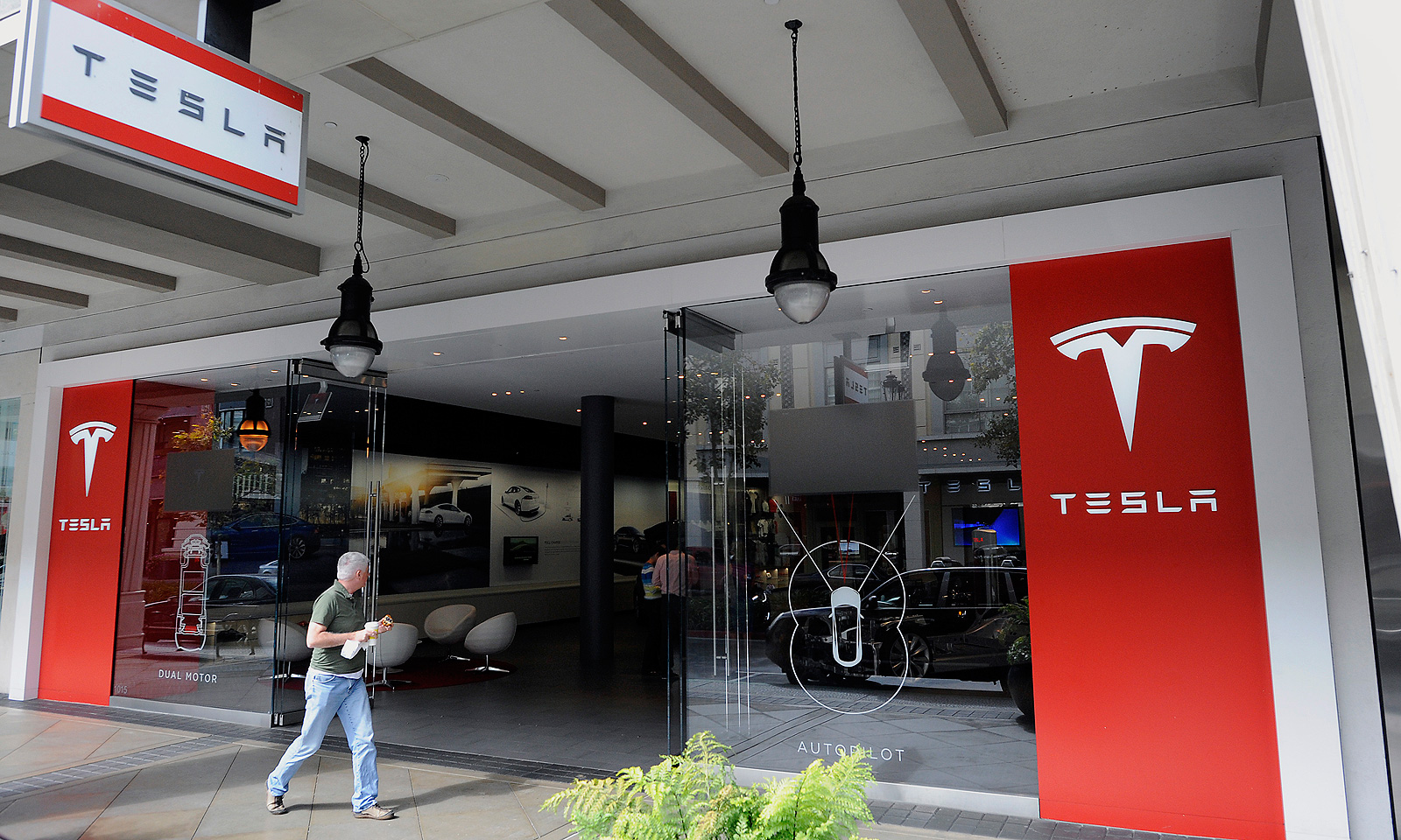 Tesla revamps retail stores, adds apparel, gear | Automotive News