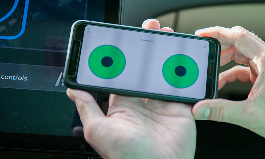 Veoneer tech allows back seat drivers to steer the car | Automotive News