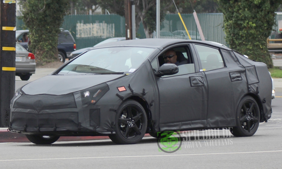 Toyota's next Prius hybrid takes on fastback styling | Automotive News