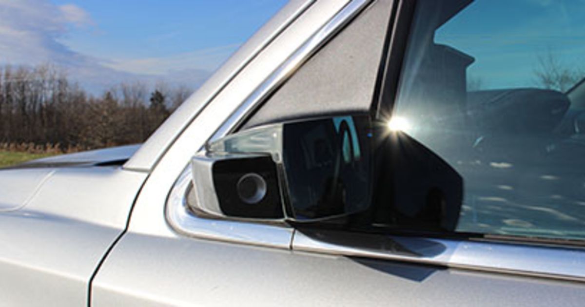 Magna opens center to design rear-facing video cameras | Automotive News