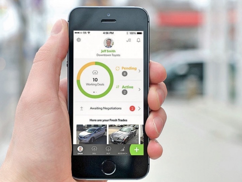 KAR Auction Services grows online business through TradeRev