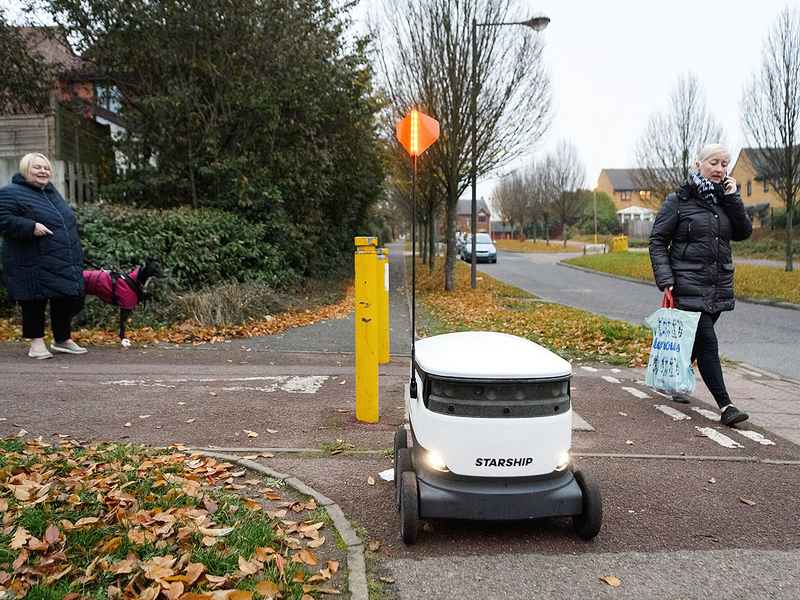 Ford tests package-carrying robots for driverless delivery