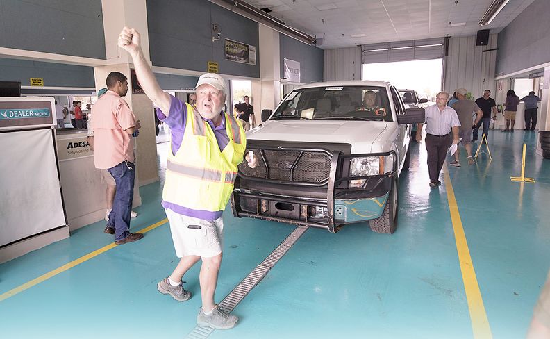 Cars return to lanes at some ADESA auction sites | Automotive News