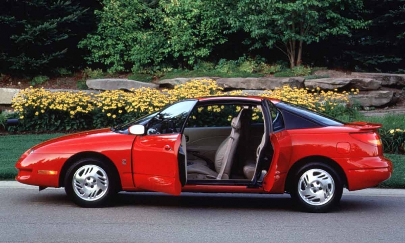 Saturn pads coupe with extra door | Automotive News