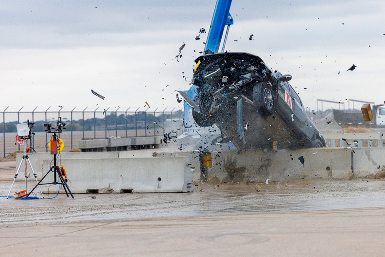Rivian R1T breaches guardrail in crash test | Automotive News