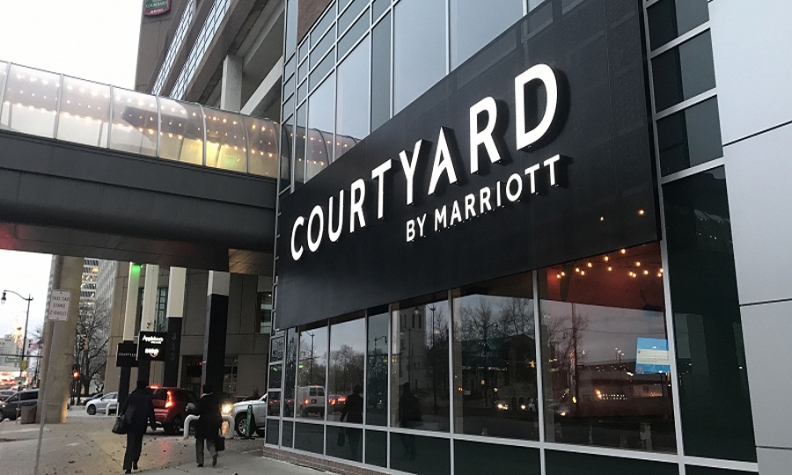 Why GM is selling a large hotel next to its headquarters in downtown ...