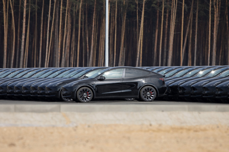 Tesla tops expectations, price cuts lift deliveries to record ...