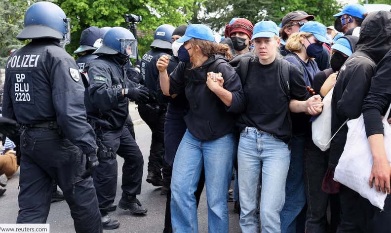 Protesters clash with police at Tesla plant in Germany | Automotive News
